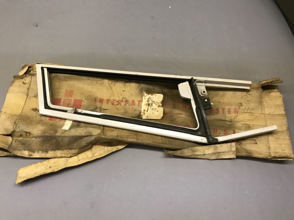 Scout 80 800 NOS Drivers Side Vent Window - IH Scout