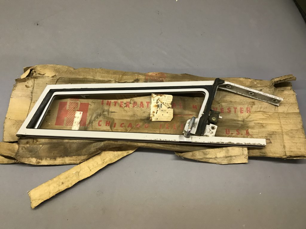 Scout 80 800 NOS Drivers Side Vent Window - IH Scout