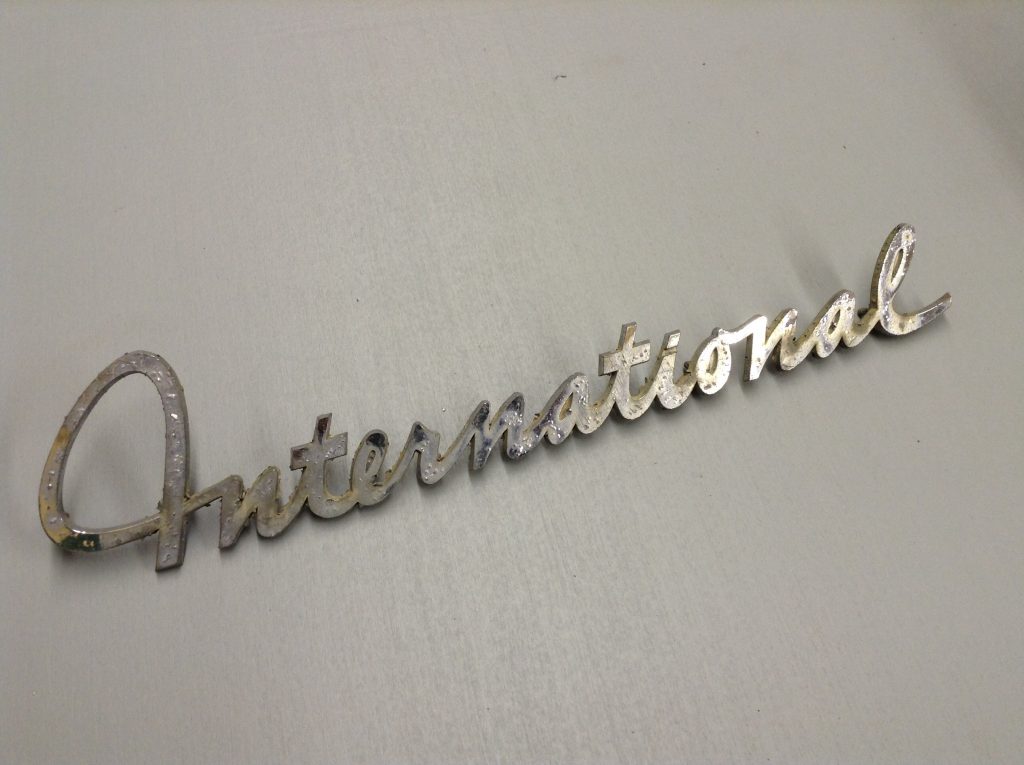 International script emblem 60's truck Travelall 13" - IH Scout